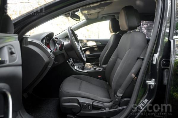 Black Opel Insignia 2009 in Tukums, with an engine capacity of 1.80 L and mileage of 158 thousand km for 4490 €, photo 9 on AUTOMOTO.COM.LV