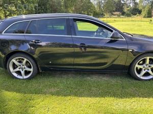 Melns Opel Insignia 2009 Ogre, ar dzinēja tilpumu 2.00 L un nobraukumu 340 tūkst. km par 3500 €, foto 4 vietnē AUTOMOTO.COM.LV