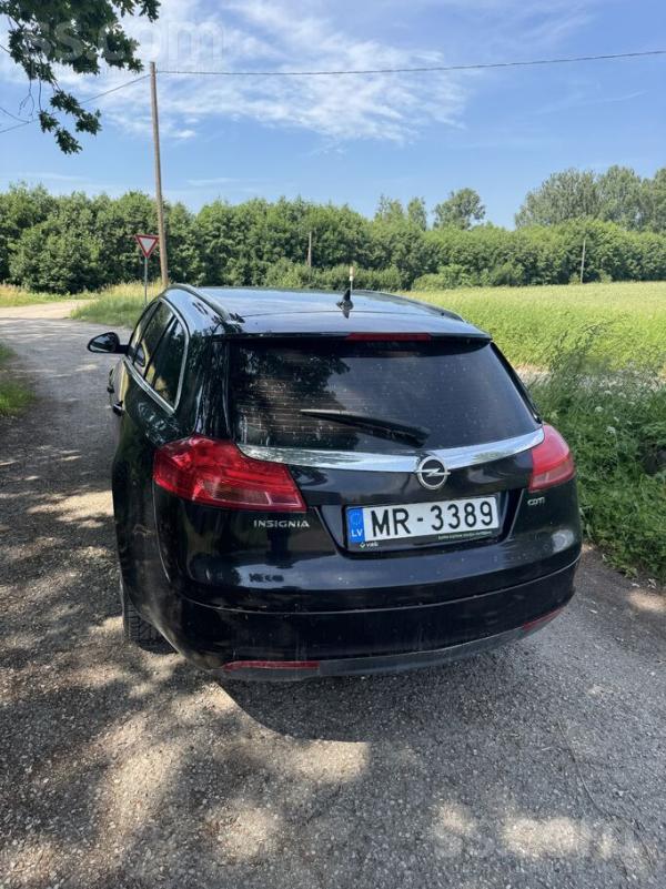 Melns Opel Insignia 2009 Kuldīga, ar dzinēja tilpumu 2.00 L un nobraukumu 269 tūkst. km par 1650 €, foto 4 vietnē AUTOMOTO.COM.LV