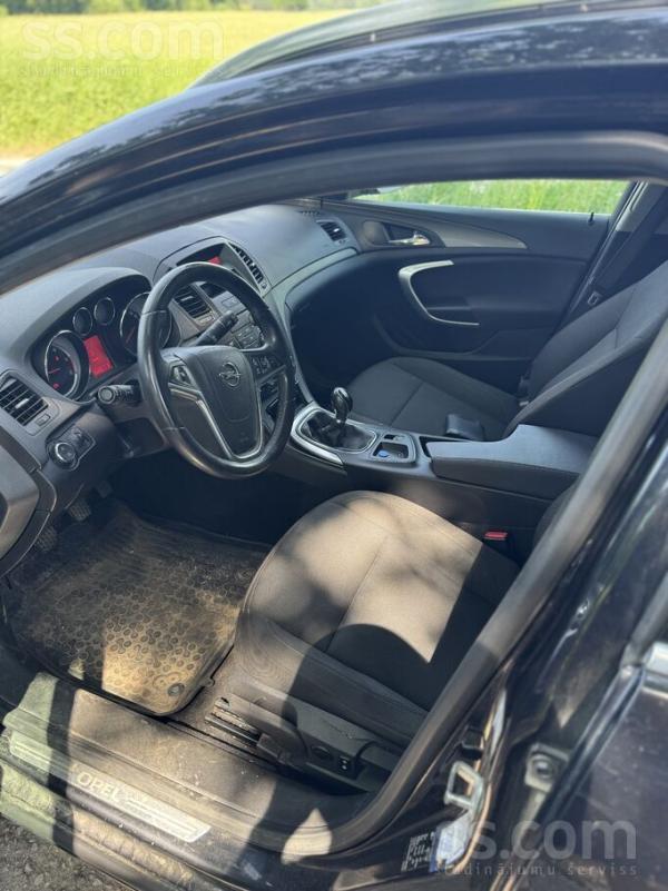 Melns Opel Insignia 2009 Kuldīga, ar dzinēja tilpumu 2.00 L un nobraukumu 269 tūkst. km par 1650 €, foto 5 vietnē AUTOMOTO.COM.LV
