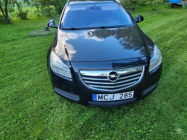 Black Opel Insignia 2009 in Kaunas, with an engine capacity of 1.96 L and mileage of 256 thousand km for 2000 €, photo 1 on AUTOMOTO.COM.LV