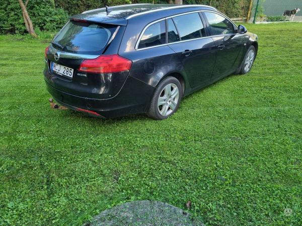 Black Opel Insignia 2009 in Kaunas, with an engine capacity of 1.96 L and mileage of 256 thousand km for 2000 €, photo 3 on AUTOMOTO.COM.LV