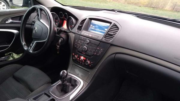 Black Opel Insignia 2009 in Kaunas, with an engine capacity of 1.96 L and mileage of 256 thousand km for 2000 €, photo 6 on AUTOMOTO.COM.LV