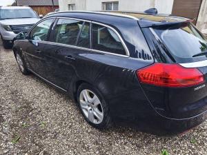 Black Opel Insignia 2009 in Siauliai, with an engine capacity of 1.80 L and mileage of 340 thousand km for 1500 €, photo 5 on AUTOMOTO.COM.LV