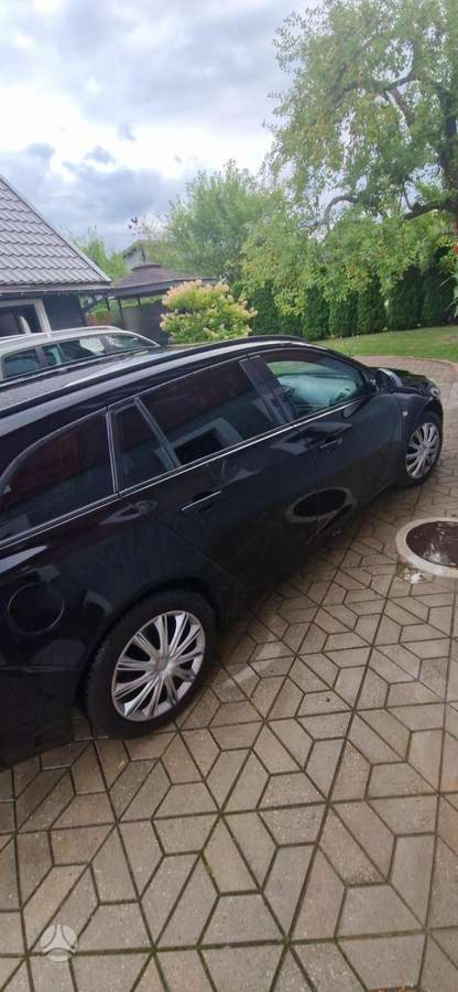 Black Opel Insignia 2009 in Kaunas, with an engine capacity of 2.00 L and mileage of 520 thousand km for 850 €, photo 6 on AUTOMOTO.COM.LV