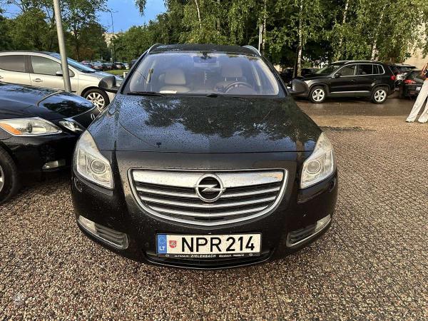 Black Opel Insignia 2009 in Vilnius, with an engine capacity of 2.00 L and mileage of 290 thousand km for 2900 €, photo 3 on AUTOMOTO.COM.LV