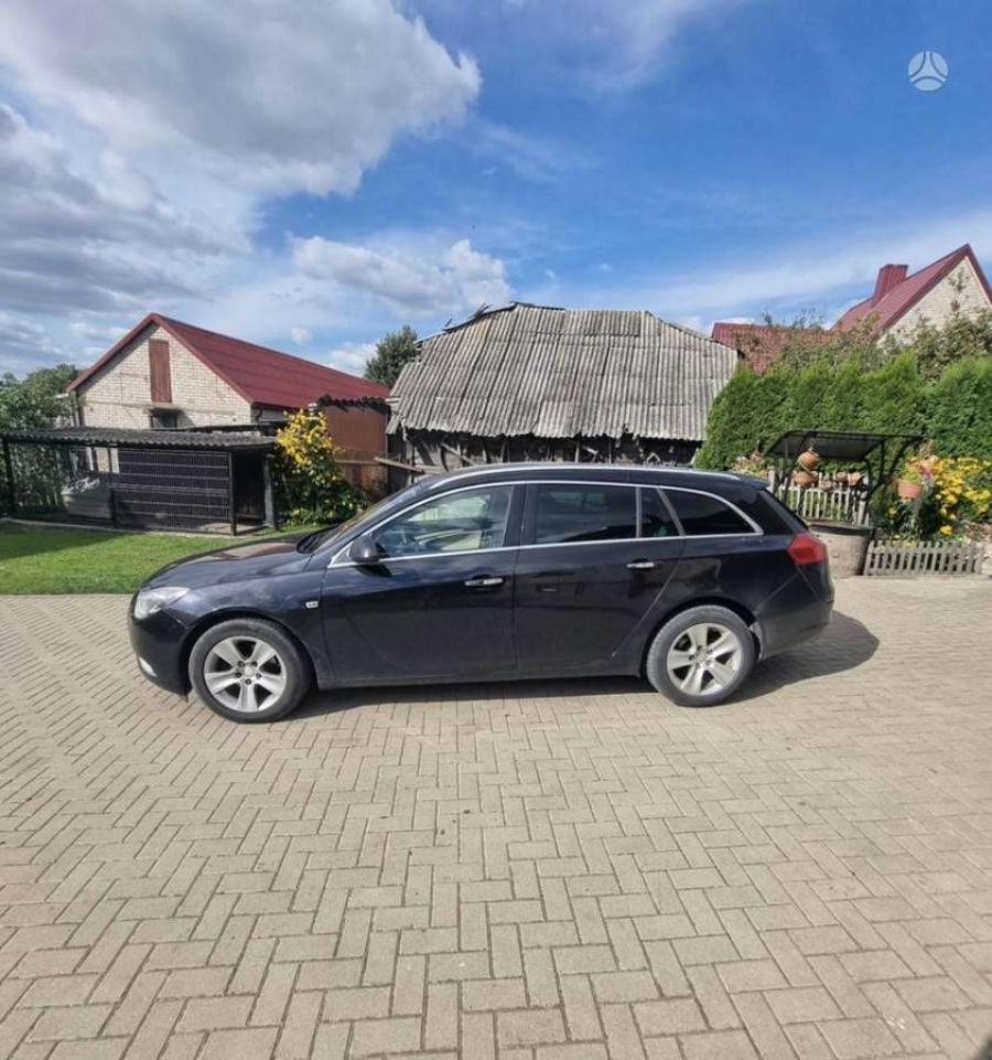 Black Opel Insignia 2009 in Kelme, with an engine capacity of 1.96 L and mileage of 0 thousand km for 2300 €, photo 4 on AUTOMOTO.COM.LV