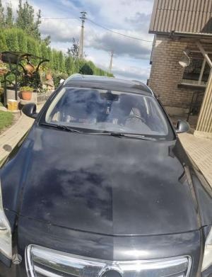 Black Opel Insignia 2009 in Kelme, with an engine capacity of 1.96 L and mileage of 0 thousand km for 2300 €, photo 6 on AUTOMOTO.COM.LV