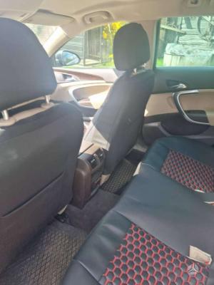 Black Opel Insignia 2009 in Kelme, with an engine capacity of 1.96 L and mileage of 0 thousand km for 2300 €, photo 10 on AUTOMOTO.COM.LV