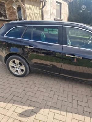 Black Opel Insignia 2009 in Kelme, with an engine capacity of 1.96 L and mileage of 0 thousand km for 2300 €, photo 12 on AUTOMOTO.COM.LV