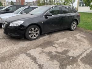 Black Opel Insignia 2010 in Kaisiadorys, with an engine capacity of 2.00 L and mileage of 321 thousand km for 1250 €, photo 3 on AUTOMOTO.COM.LV