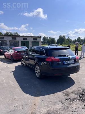 Melns Opel Insignia 2010 Rīga, ar dzinēja tilpumu 2.00 L un nobraukumu 301 tūkst. km par 2000 €, foto 3 vietnē AUTOMOTO.COM.LV
