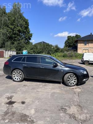 Melns Opel Insignia 2010 Rīga, ar dzinēja tilpumu 2.00 L un nobraukumu 301 tūkst. km par 2000 €, foto 4 vietnē AUTOMOTO.COM.LV