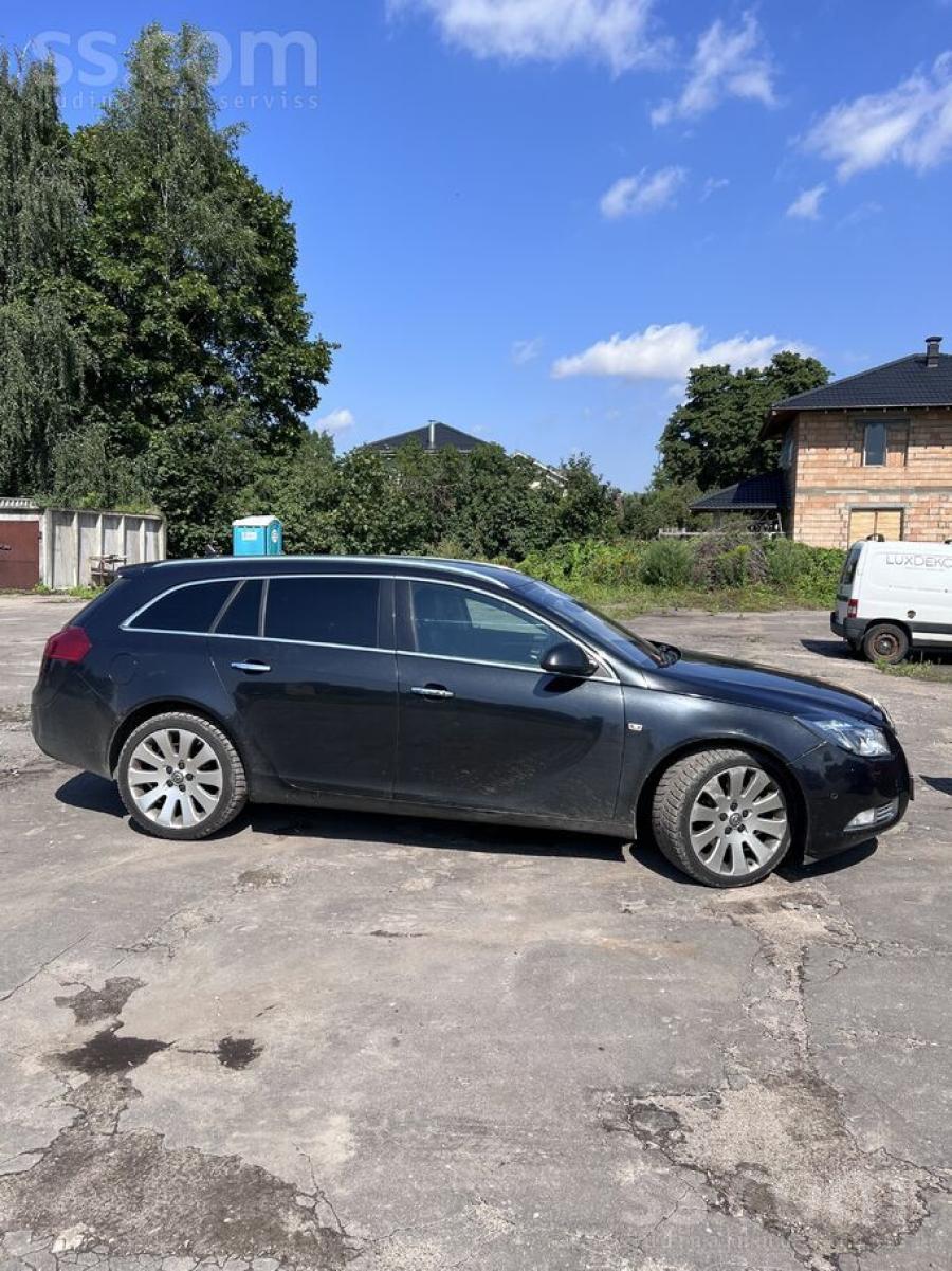 Melns Opel Insignia 2010 Rīga, ar dzinēja tilpumu 2.00 L un nobraukumu 301 tūkst. km par 2000 €, foto 4 vietnē AUTOMOTO.COM.LV