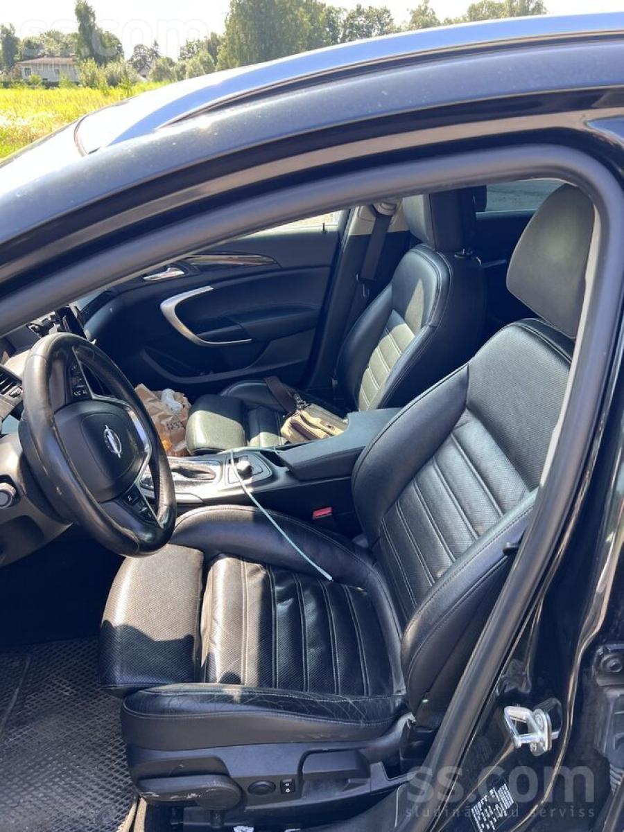 Melns Opel Insignia 2010 Rīga, ar dzinēja tilpumu 2.00 L un nobraukumu 301 tūkst. km par 2000 €, foto 7 vietnē AUTOMOTO.COM.LV