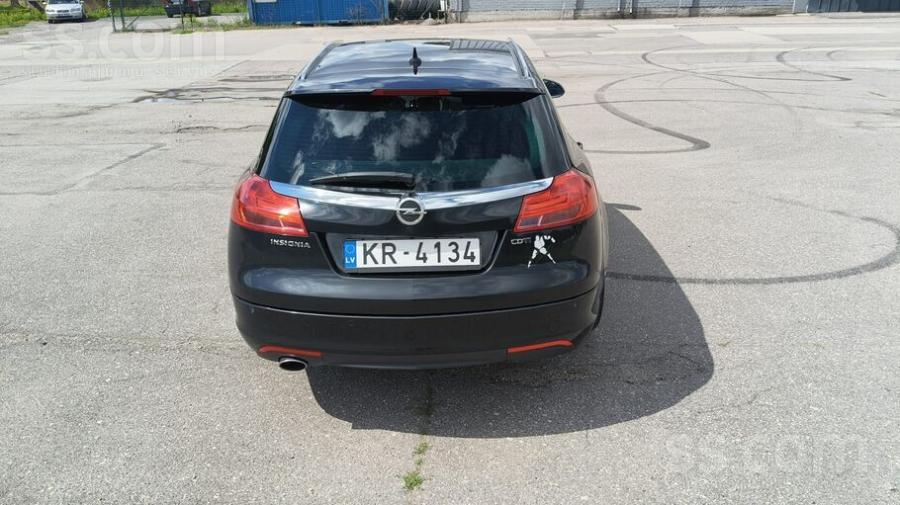 Black Opel Insignia 2010 in Riga, with an engine capacity of 2.00 L and mileage of 315 thousand km for 3100 €, photo 5 on AUTOMOTO.COM.LV