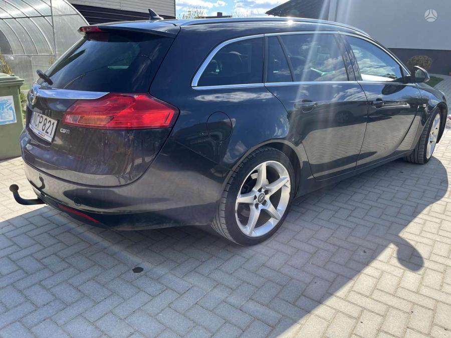 Black Opel Insignia 2010 in Kaunas, with an engine capacity of 1.96 L and mileage of 267 thousand km for 3200 €, photo 3 on AUTOMOTO.COM.LV