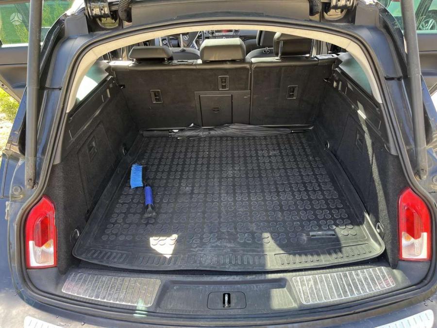 Black Opel Insignia 2010 in Kaunas, with an engine capacity of 1.96 L and mileage of 267 thousand km for 3200 €, photo 12 on AUTOMOTO.COM.LV