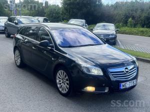 Black Opel Insignia 2010 in Riga, with an engine capacity of 2.00 L and mileage of 290 thousand km for 1899 €, photo 4 on AUTOMOTO.COM.LV