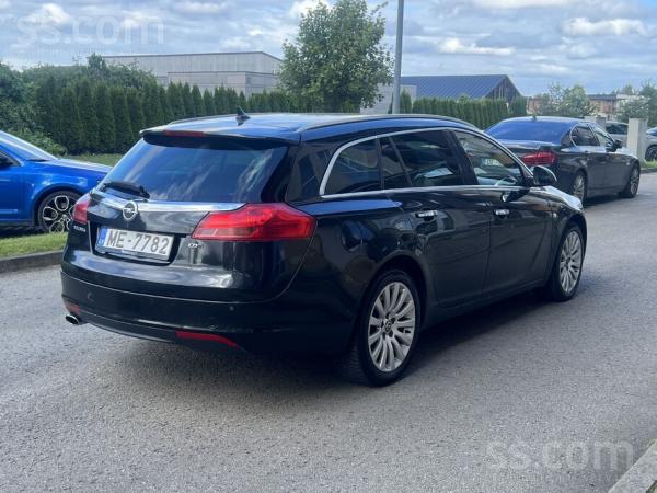 Melns Opel Insignia 2010 Rīga, ar dzinēja tilpumu 2.00 L un nobraukumu 290 tūkst. km par 1899 €, foto 5 vietnē AUTOMOTO.COM.LV