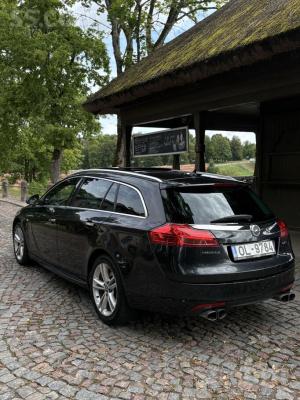 Black Opel Insignia 2010 in Kuldiga, with an engine capacity of 2.00 L and mileage of 272 thousand km for 3900 €, photo 13 on AUTOMOTO.COM.LV