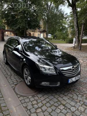 Black Opel Insignia 2010 in Kuldiga, with an engine capacity of 2.00 L and mileage of 272 thousand km for 3900 €, photo 14 on AUTOMOTO.COM.LV