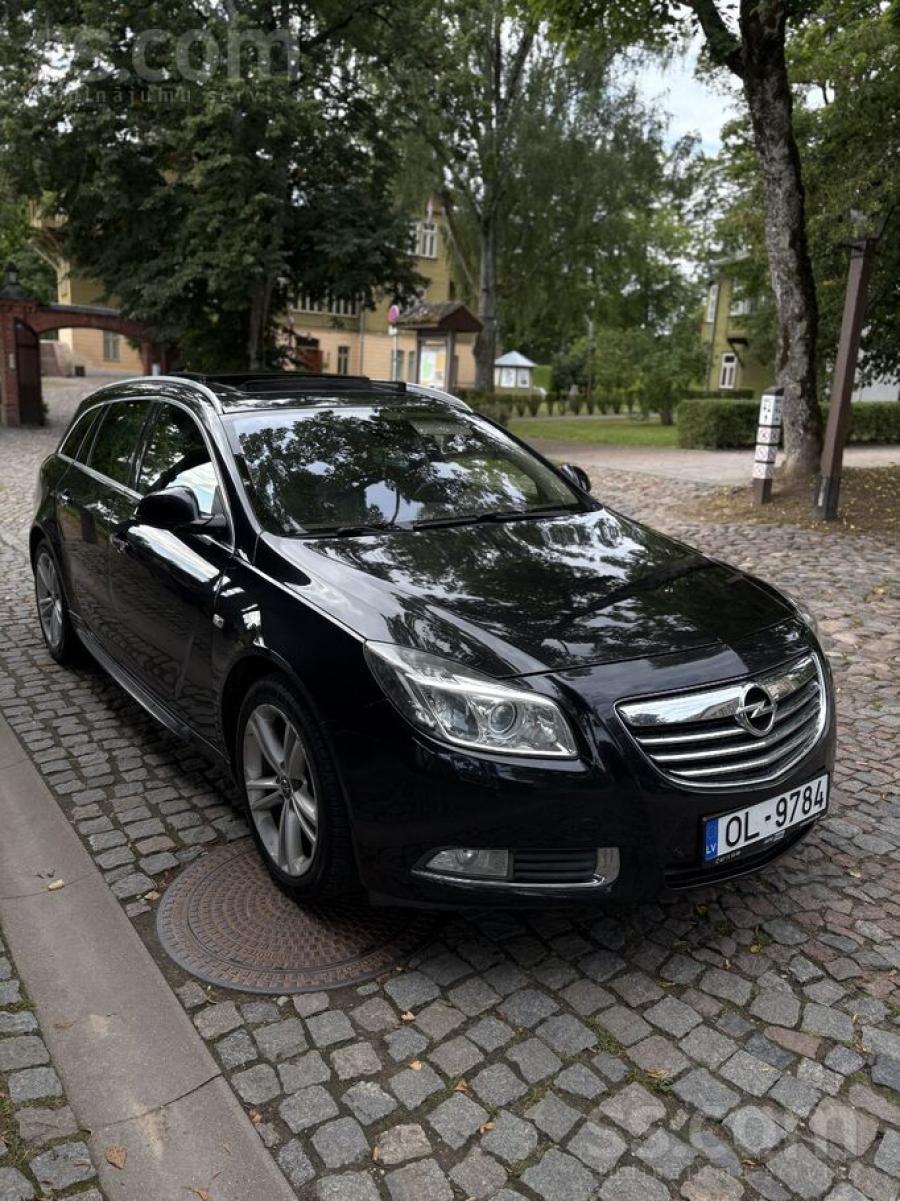 Black Opel Insignia 2010 in Kuldiga, with an engine capacity of 2.00 L and mileage of 272 thousand km for 3900 €, photo 14 on AUTOMOTO.COM.LV