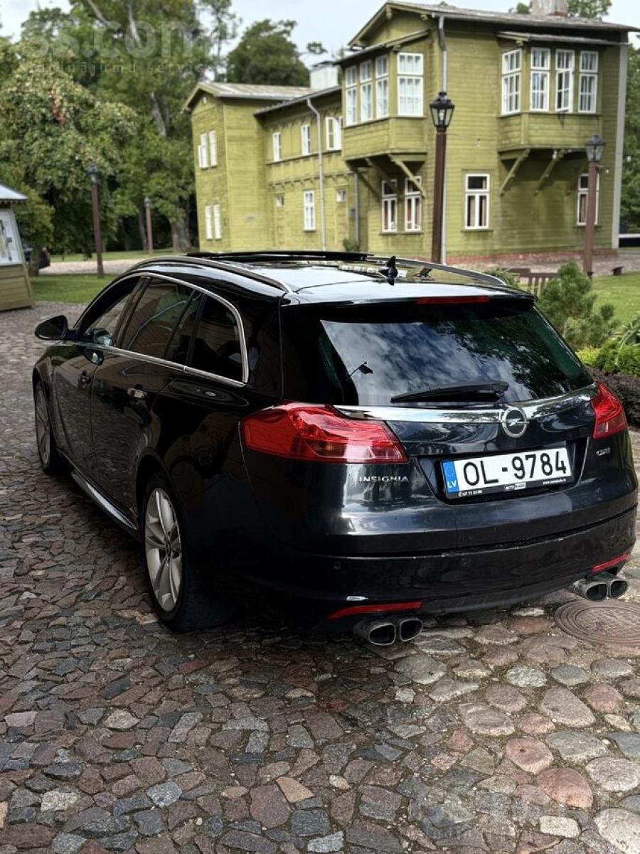 Black Opel Insignia 2010 in Kuldiga, with an engine capacity of 2.00 L and mileage of 272 thousand km for 3900 €, photo 15 on AUTOMOTO.COM.LV