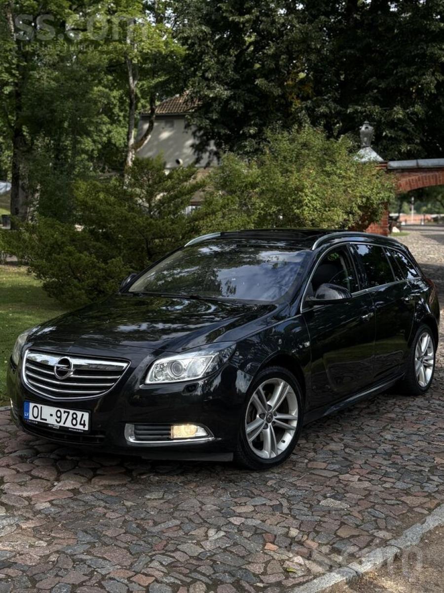 Black Opel Insignia 2010 in Kuldiga, with an engine capacity of 2.00 L and mileage of 272 thousand km for 3900 €, photo 16 on AUTOMOTO.COM.LV