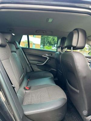 Black Opel Insignia 2010 in Vilnius, with an engine capacity of 1.96 L and mileage of 309 thousand km for 1350 €, photo 8 on AUTOMOTO.COM.LV