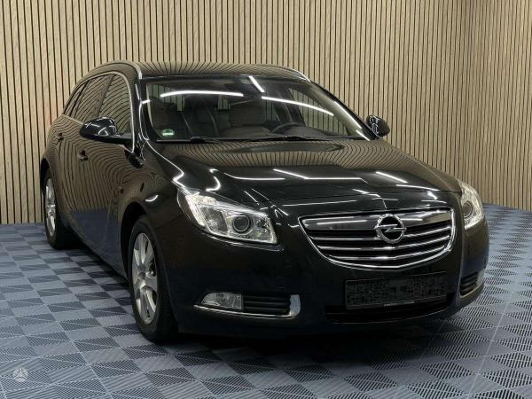 Black Opel Insignia 2010 in Marijampole, with an engine capacity of 1.96 L and mileage of 294 thousand km for 3900 €, photo 1 on AUTOMOTO.COM.LV