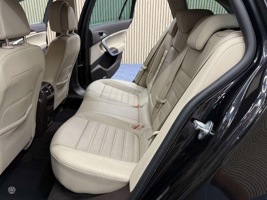 Black Opel Insignia 2010 in Marijampole, with an engine capacity of 1.96 L and mileage of 294 thousand km for 3900 €, photo 18 on AUTOMOTO.COM.LV