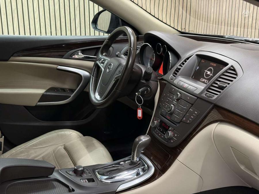 Black Opel Insignia 2010 in Marijampole, with an engine capacity of 1.96 L and mileage of 294 thousand km for 3900 €, photo 21 on AUTOMOTO.COM.LV