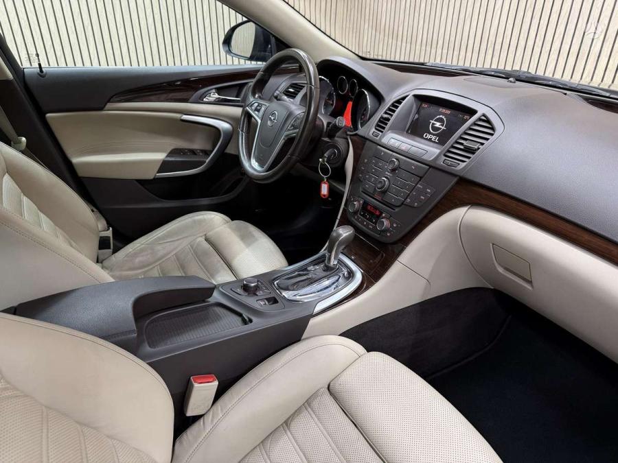 Black Opel Insignia 2010 in Marijampole, with an engine capacity of 1.96 L and mileage of 294 thousand km for 3900 €, photo 31 on AUTOMOTO.COM.LV