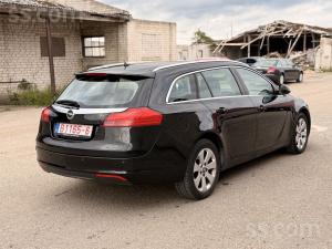 Black Opel Insignia 2010 in Liepaja, with an engine capacity of 2.00 L and mileage of 242 thousand km for 3200 €, photo 6 on AUTOMOTO.COM.LV