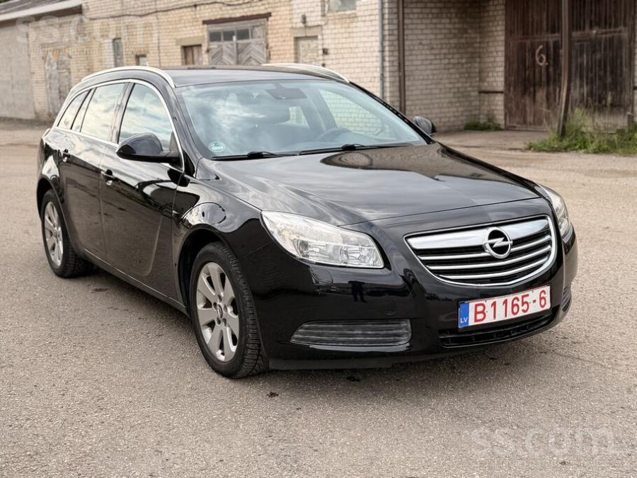 Black Opel Insignia 2010 in Liepaja, with an engine capacity of 2.00 L and mileage of 242 thousand km for 3200 €, photo 7 on AUTOMOTO.COM.LV