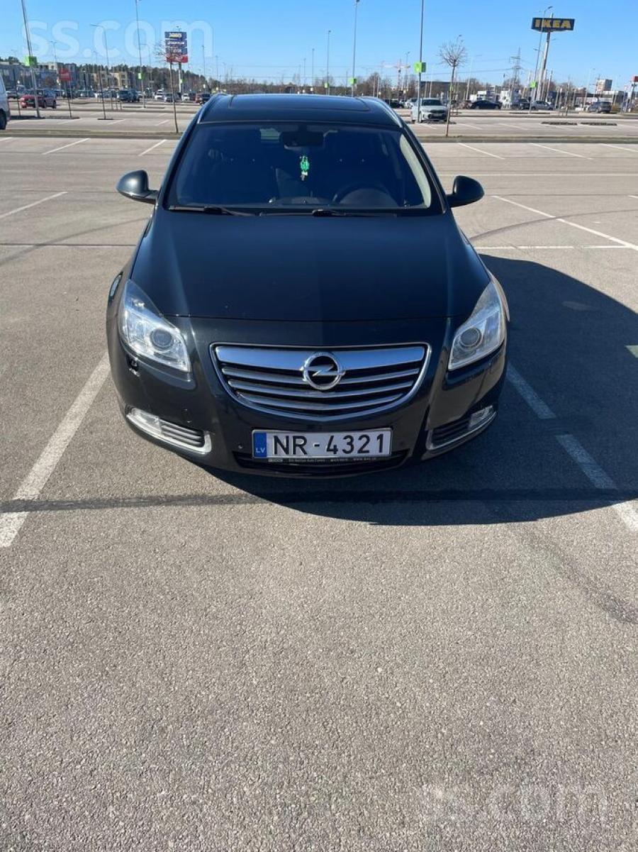 Black Opel Insignia 2011 in Riga, with an engine capacity of 2.00 L and mileage of 265 thousand km for 2650 €, photo 9 on AUTOMOTO.COM.LV