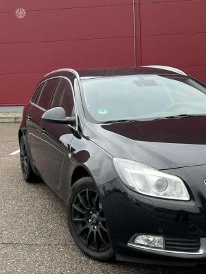 Black Opel Insignia 2011 in Kaunas, with an engine capacity of 1.96 L and mileage of 253 thousand km for 2950 €, photo 4 on AUTOMOTO.COM.LV