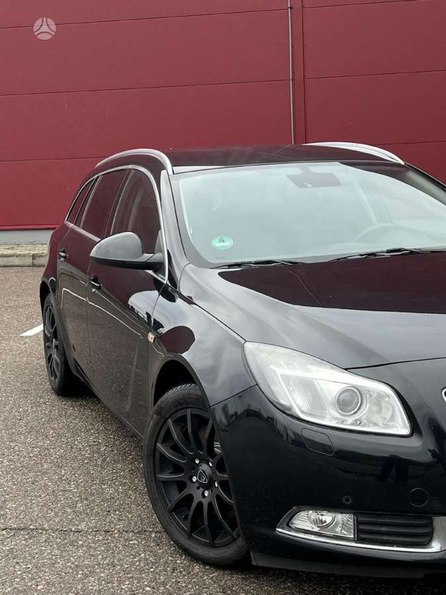 Black Opel Insignia 2011 in Kaunas, with an engine capacity of 1.96 L and mileage of 253 thousand km for 2950 €, photo 4 on AUTOMOTO.COM.LV