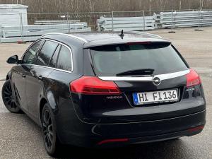 Black Opel Insignia 2011 in Kaunas, with an engine capacity of 1.96 L and mileage of 253 thousand km for 2950 €, photo 6 on AUTOMOTO.COM.LV