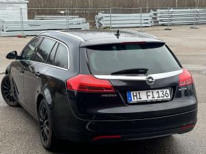 Black Opel Insignia 2011 in Kaunas, with an engine capacity of 1.96 L and mileage of 253 thousand km for 2950 €, photo 7 on AUTOMOTO.COM.LV