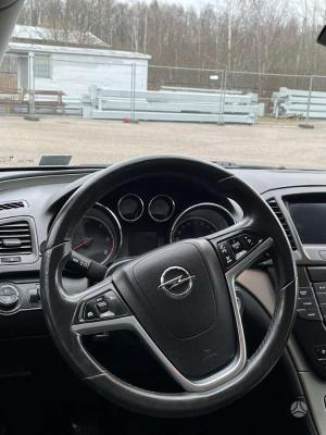 Black Opel Insignia 2011 in Kaunas, with an engine capacity of 1.96 L and mileage of 253 thousand km for 2950 €, photo 12 on AUTOMOTO.COM.LV