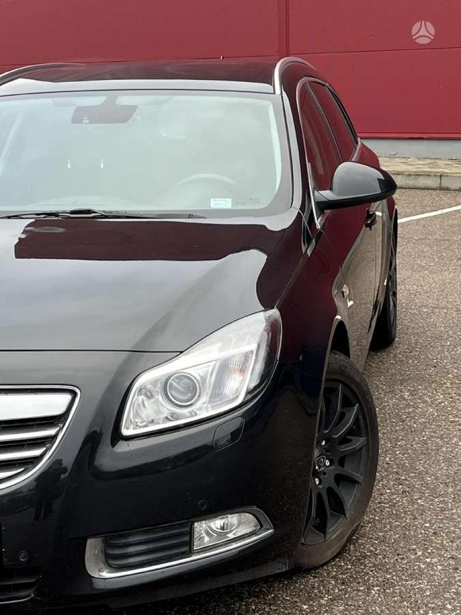 Black Opel Insignia 2011 in Kaunas, with an engine capacity of 1.96 L and mileage of 253 thousand km for 2950 €, photo 20 on AUTOMOTO.COM.LV