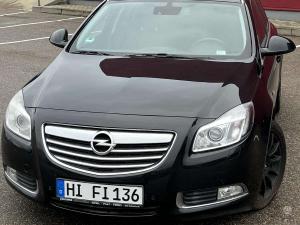Black Opel Insignia 2011 in Kaunas, with an engine capacity of 1.96 L and mileage of 253 thousand km for 2950 €, photo 21 on AUTOMOTO.COM.LV