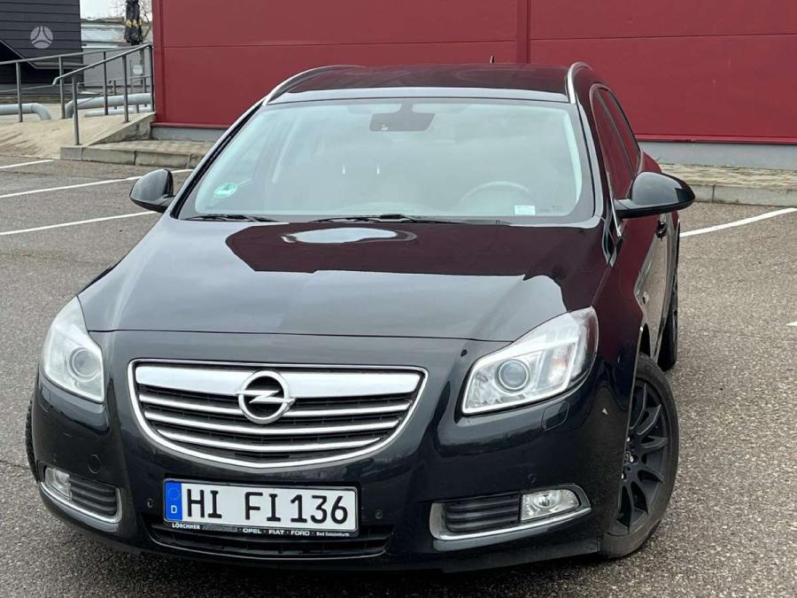 Black Opel Insignia 2011 in Kaunas, with an engine capacity of 1.96 L and mileage of 253 thousand km for 2950 €, photo 22 on AUTOMOTO.COM.LV