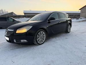 Black Opel Insignia 2011 in Kaunas, with an engine capacity of 1.96 L and mileage of 322 thousand km for 2499 €, photo  on AUTOMOTO.COM.LV