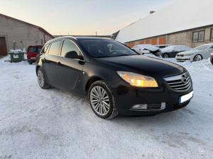 Black Opel Insignia 2011 in Kaunas, with an engine capacity of 1.96 L and mileage of 322 thousand km for 2499 €, photo 3 on AUTOMOTO.COM.LV