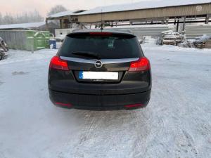 Black Opel Insignia 2011 in Kaunas, with an engine capacity of 1.96 L and mileage of 322 thousand km for 2499 €, photo 5 on AUTOMOTO.COM.LV