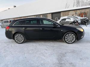 Black Opel Insignia 2011 in Kaunas, with an engine capacity of 1.96 L and mileage of 322 thousand km for 2499 €, photo 8 on AUTOMOTO.COM.LV