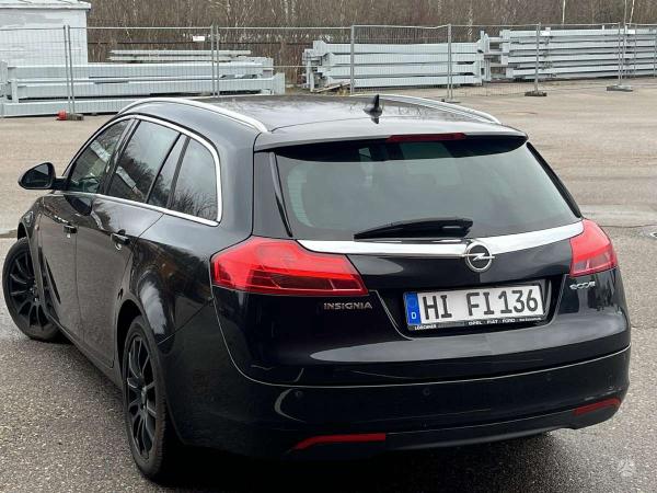 Black Opel Insignia 2011 in Kaunas, with an engine capacity of 2.00 L and mileage of 253 thousand km for 2950 €, photo 4 on AUTOMOTO.COM.LV